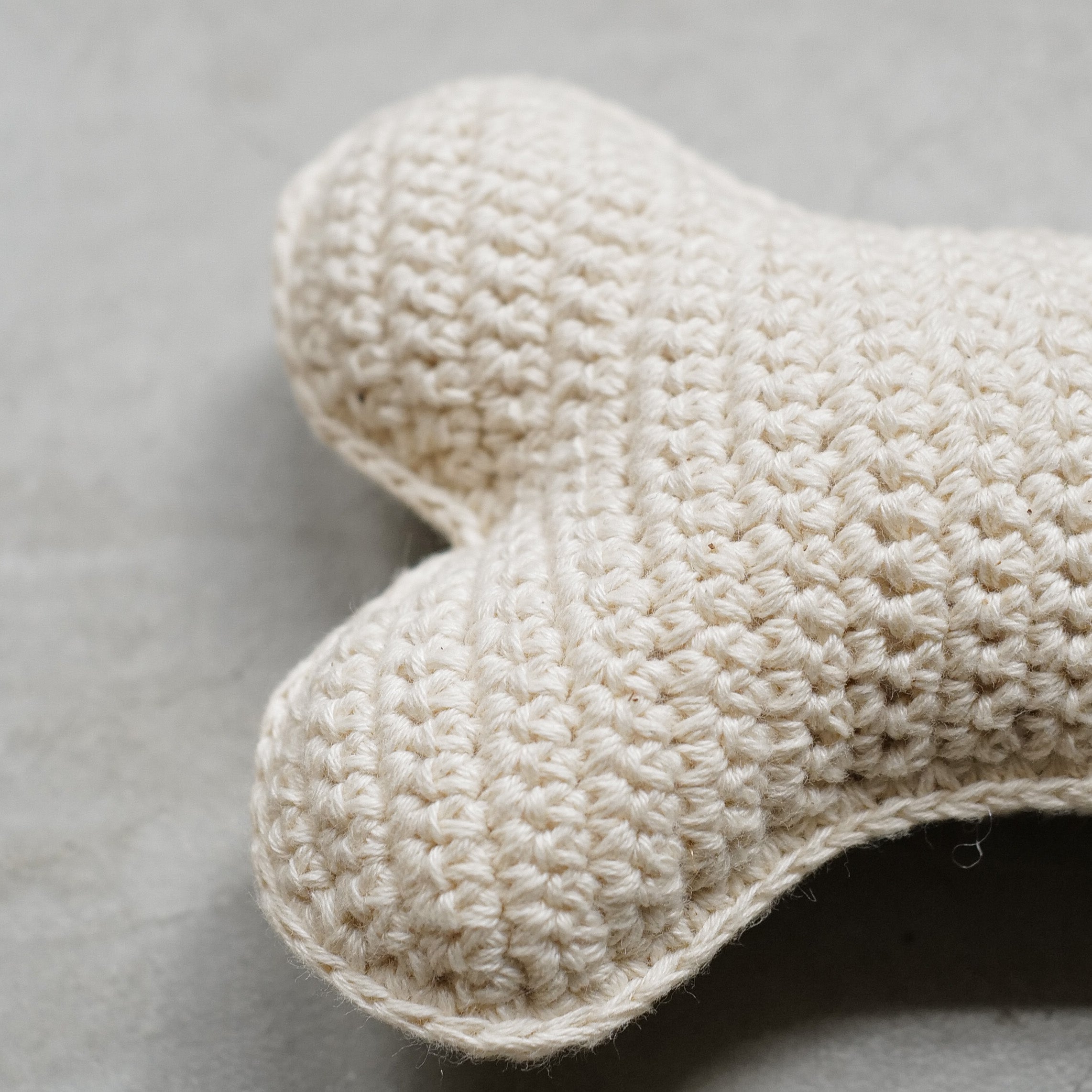 DOG BONE RATTLE – ABOUT
